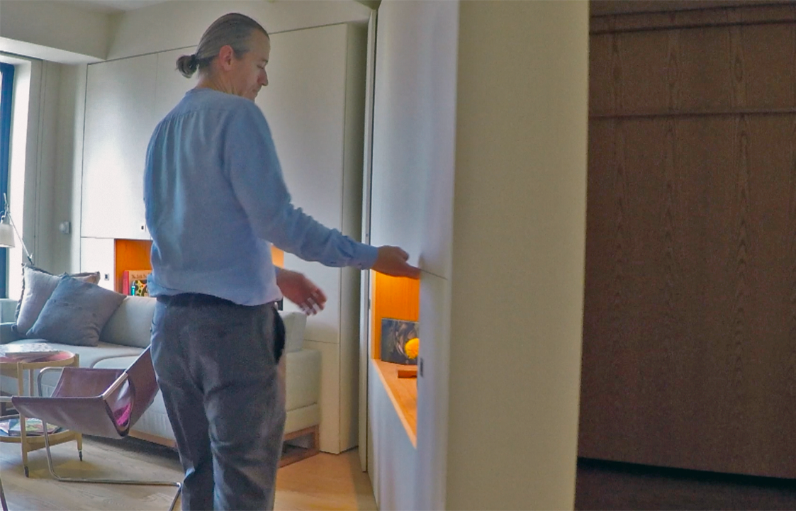 Pivoting wall adds/subtracts rooms in NYC modular micro-flat ...