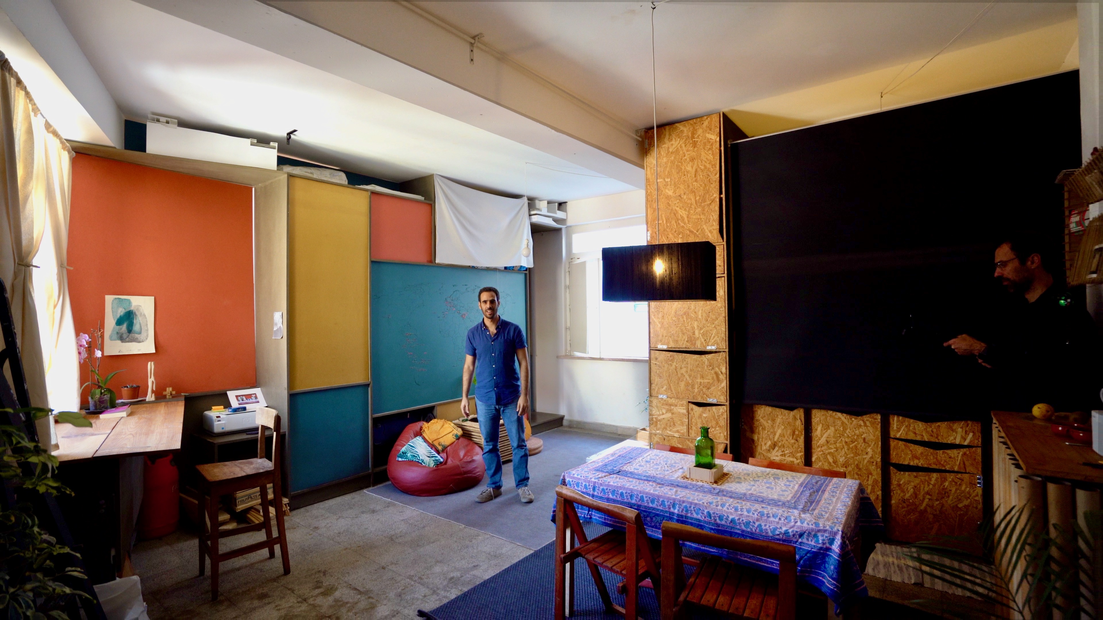 Studio flat hides living area behind Mondrian-esque furniture ...